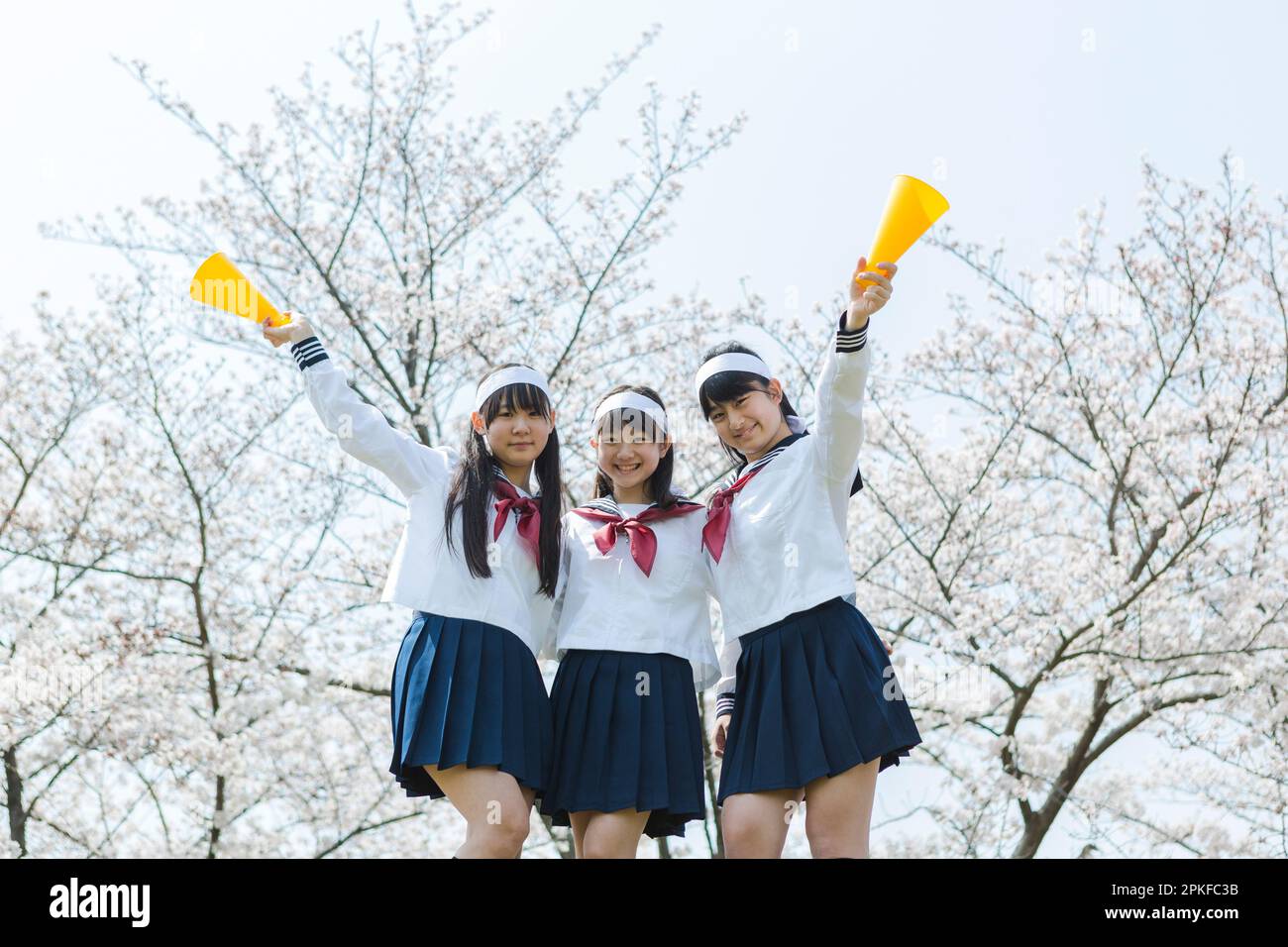 School girls cheering Stock Photo - Alamy
