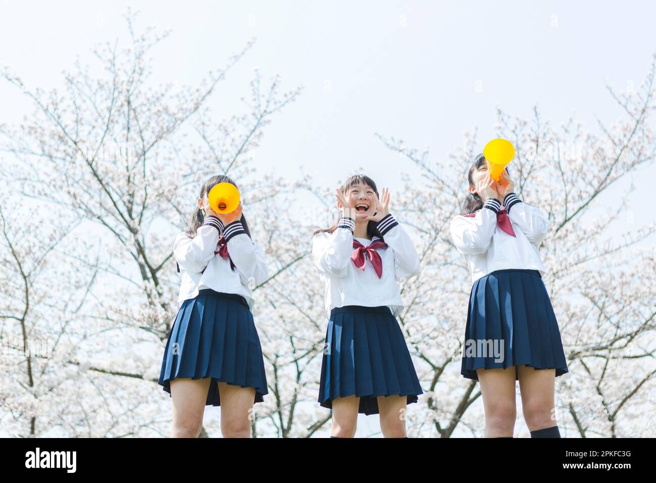 School girls cheering Stock Photo - Alamy