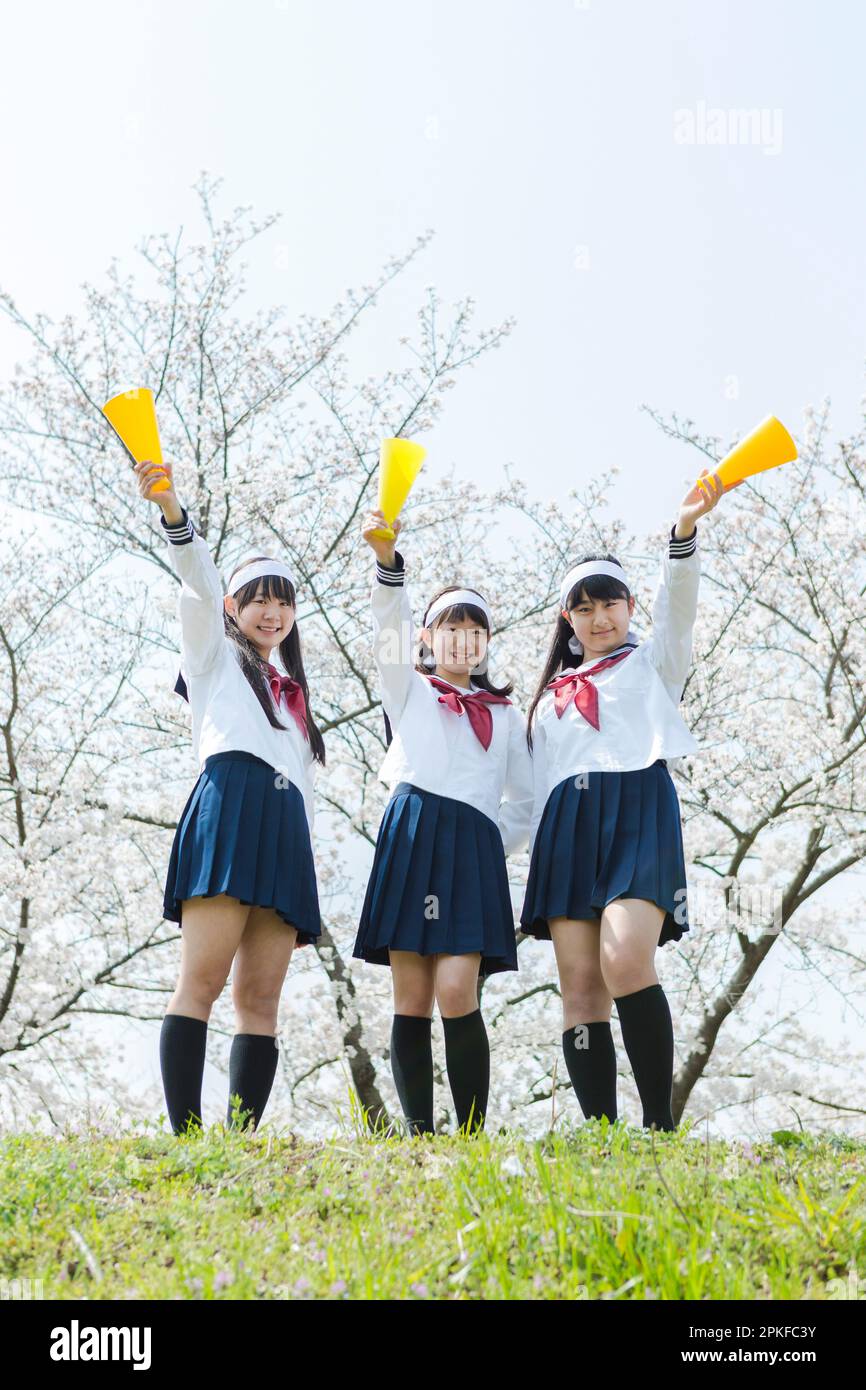 School girls cheering Stock Photo - Alamy