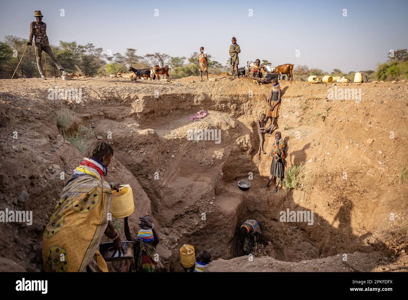 Kenya. 18th Feb, 2023. Turkana people sourcing water from a well to ...
