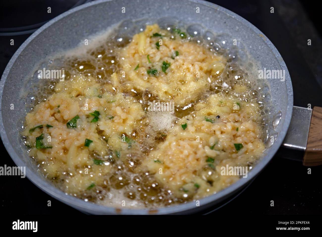 Fried rice ball, traditional Brazilian snack Stock Photo - Alamy