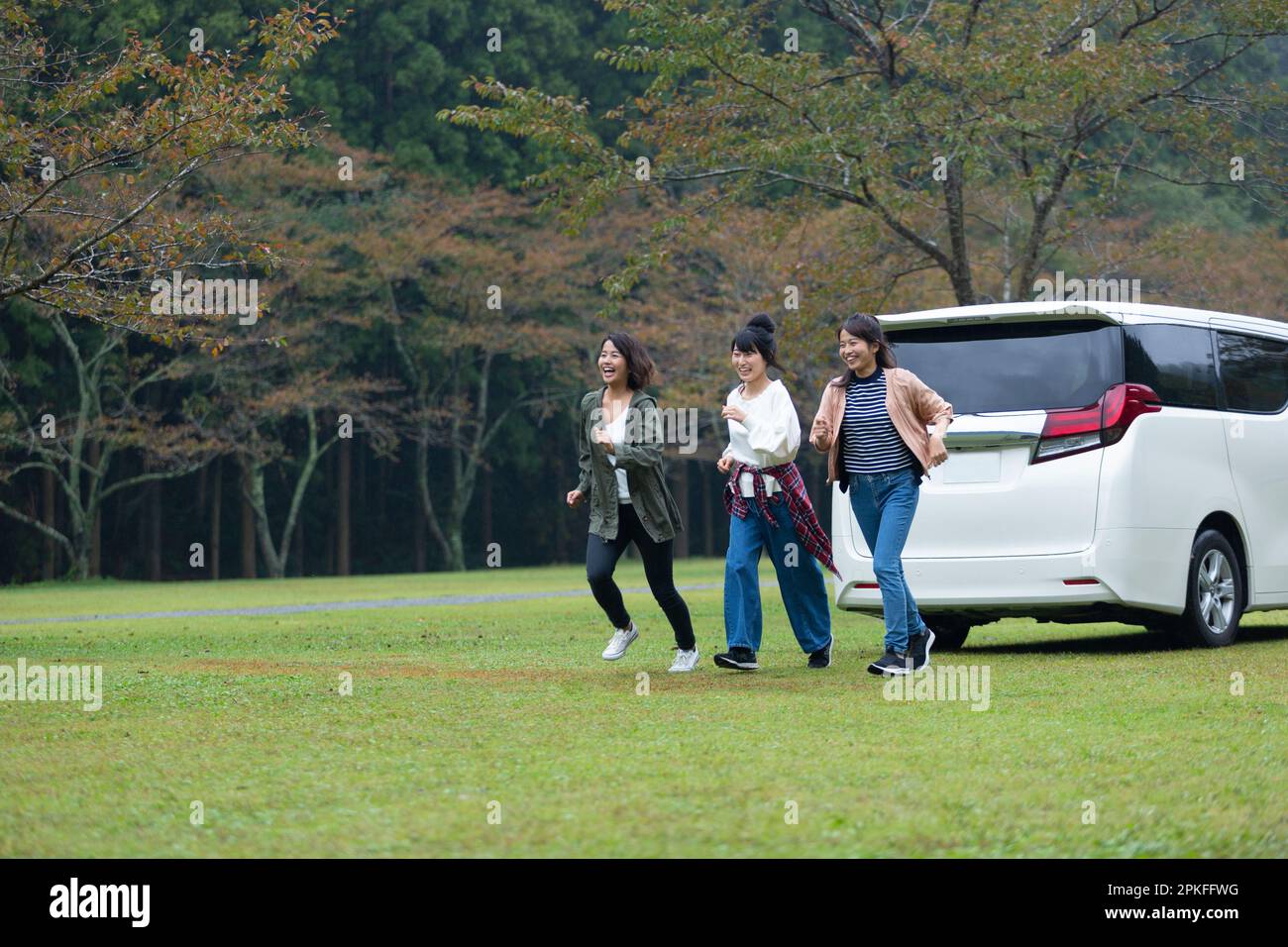 Woman Running Out Stock Photo - Alamy