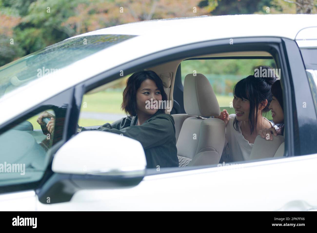 Woman chatting in car Stock Photo - Alamy
