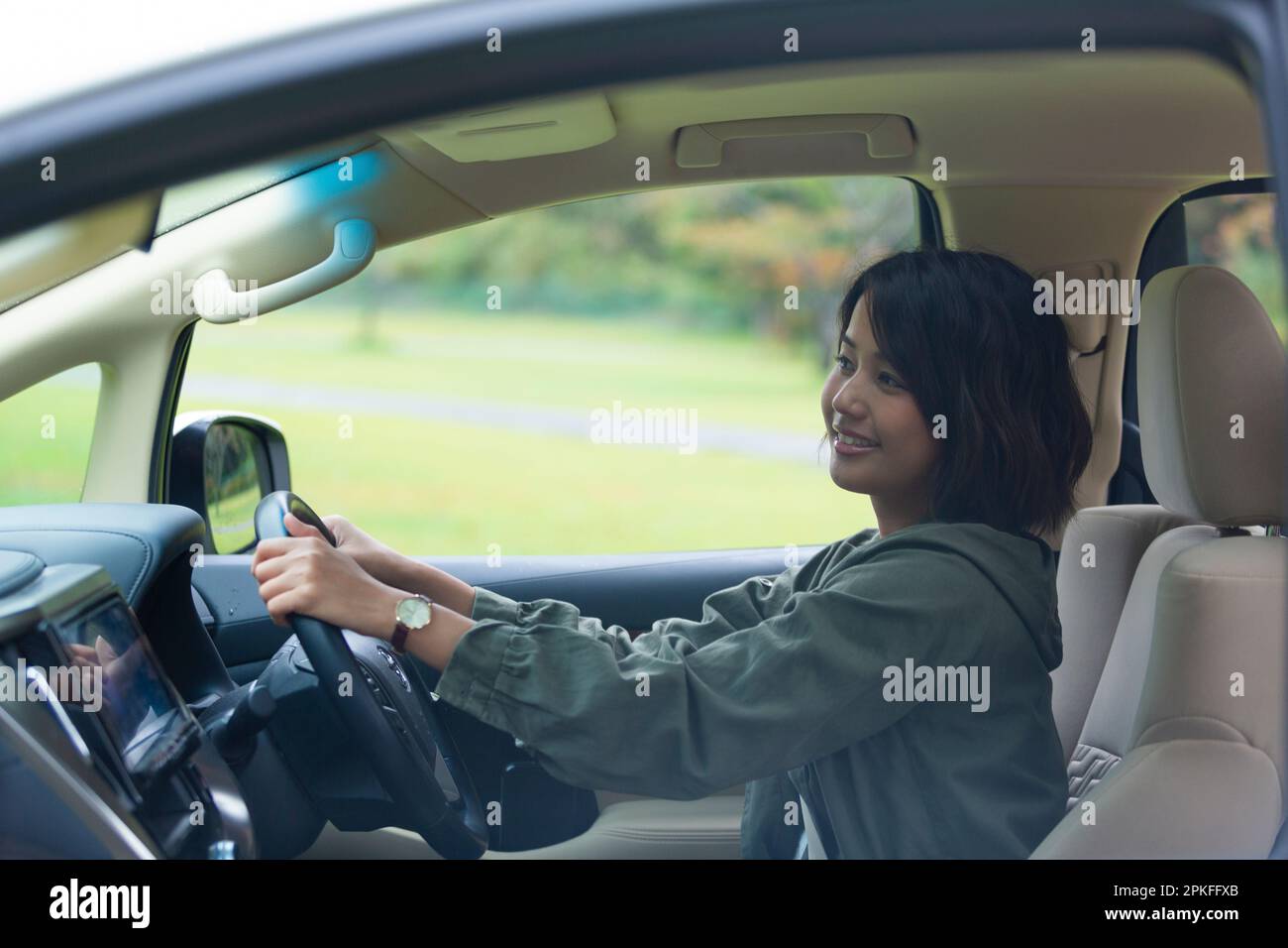 Woman driving car autumn hi-res stock photography and images - Alamy