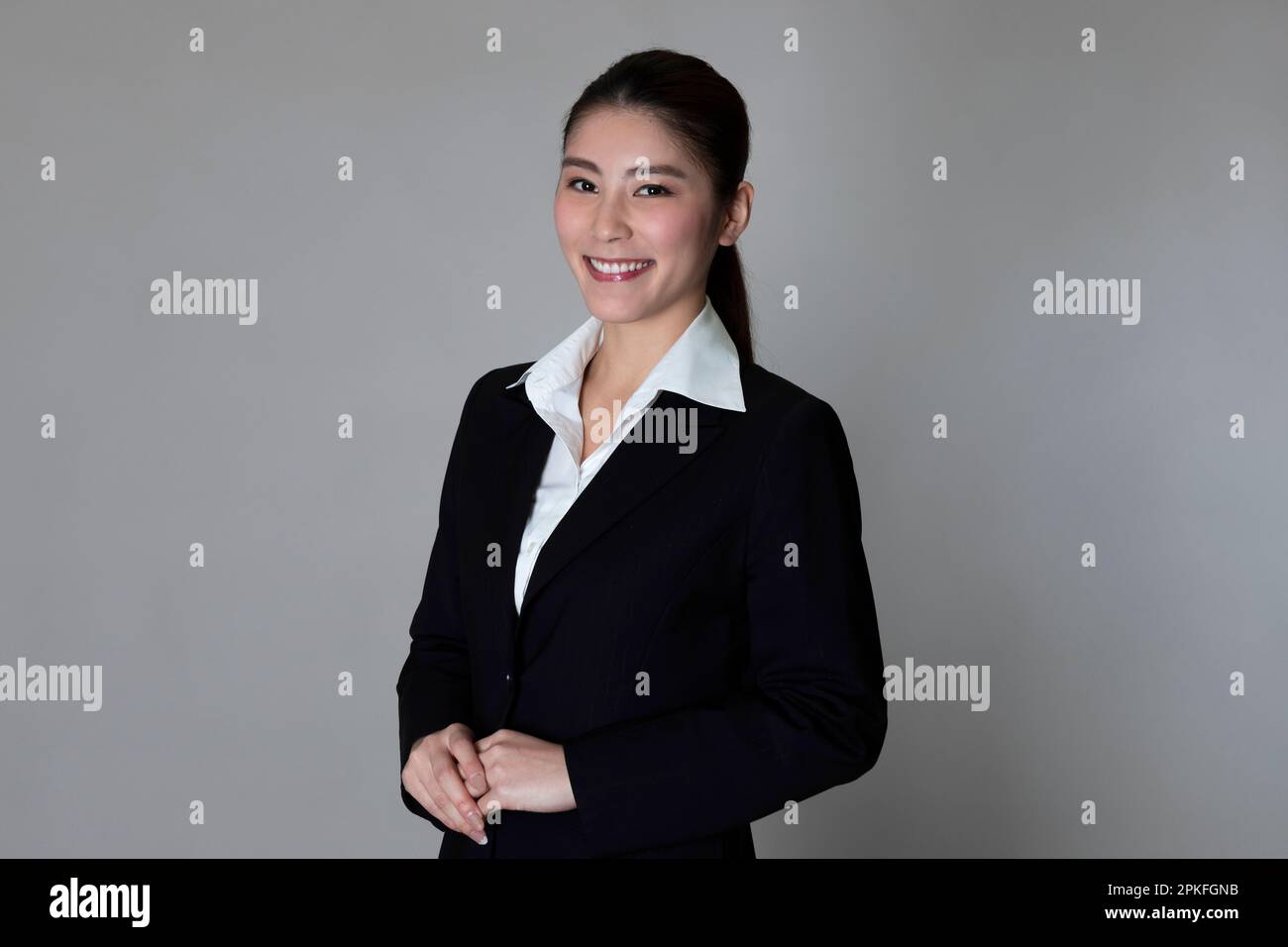 Portrait of Woman in Suit Stock Photo - Alamy