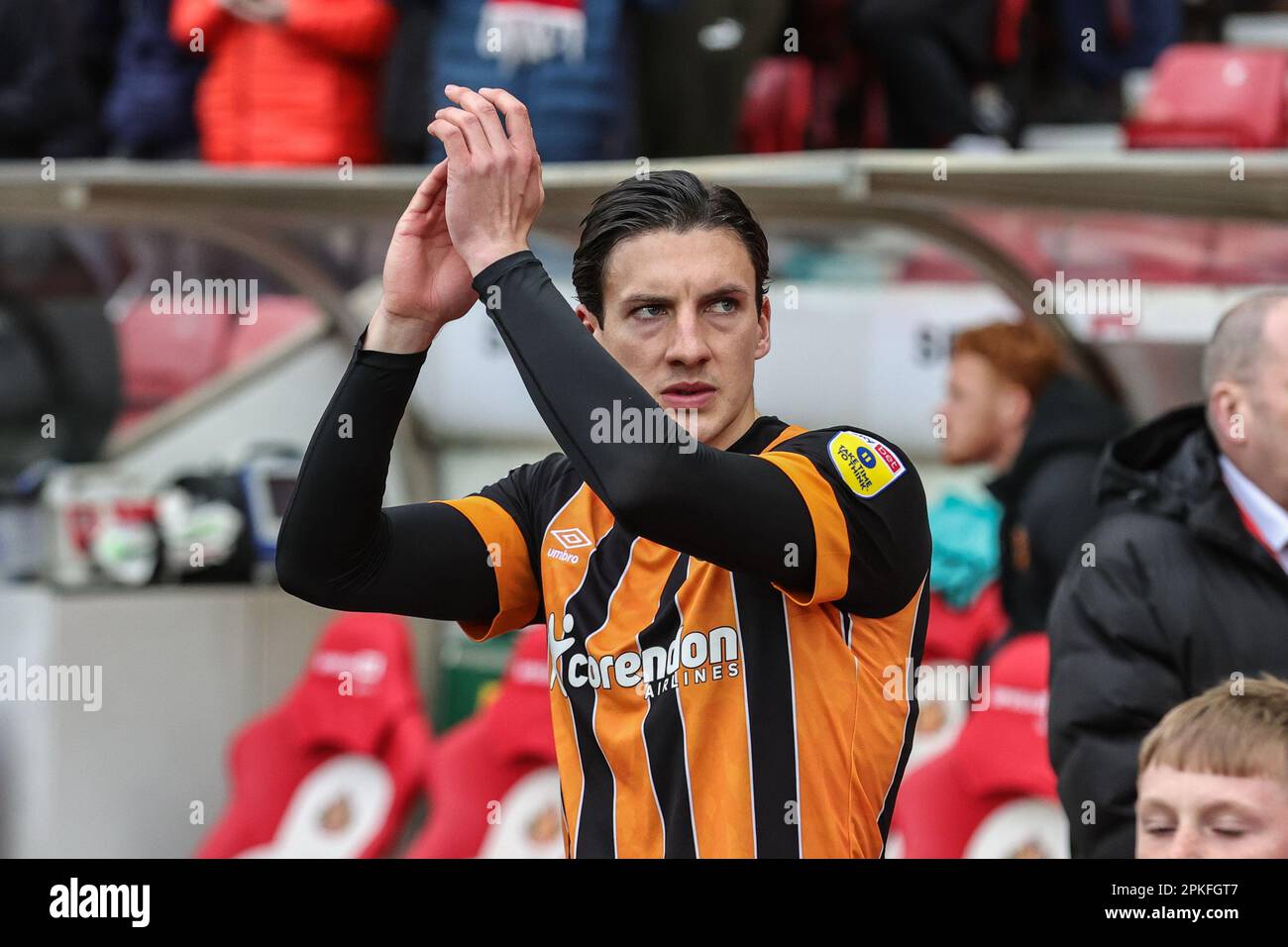 Alfie Jones #5 of Hull City applauds the traveling fans during the Sky ...