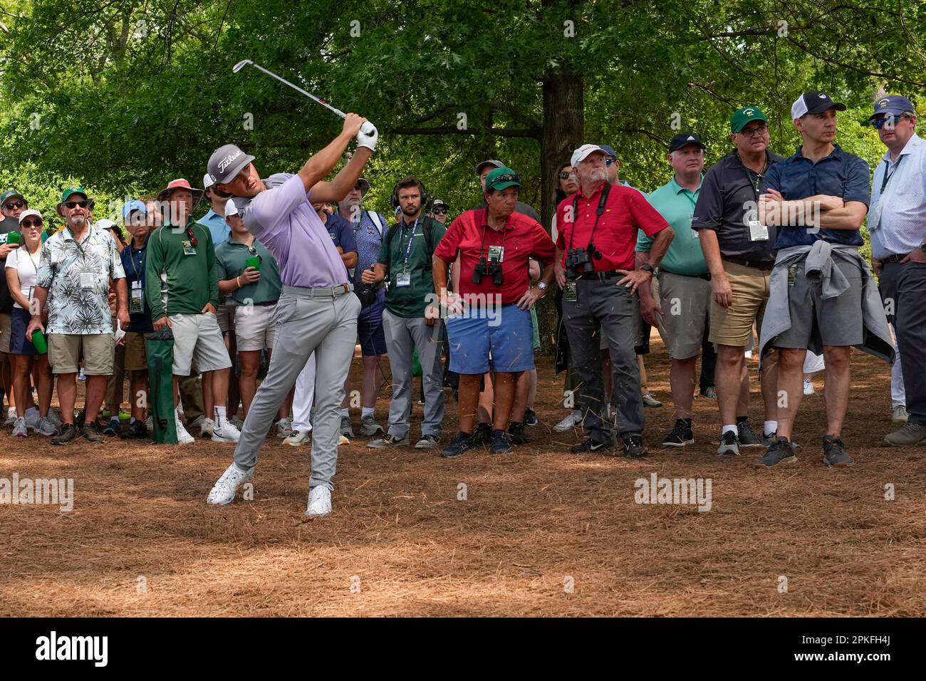 Harrison Crowe, of Australia, hits from the pine straw on the second ...