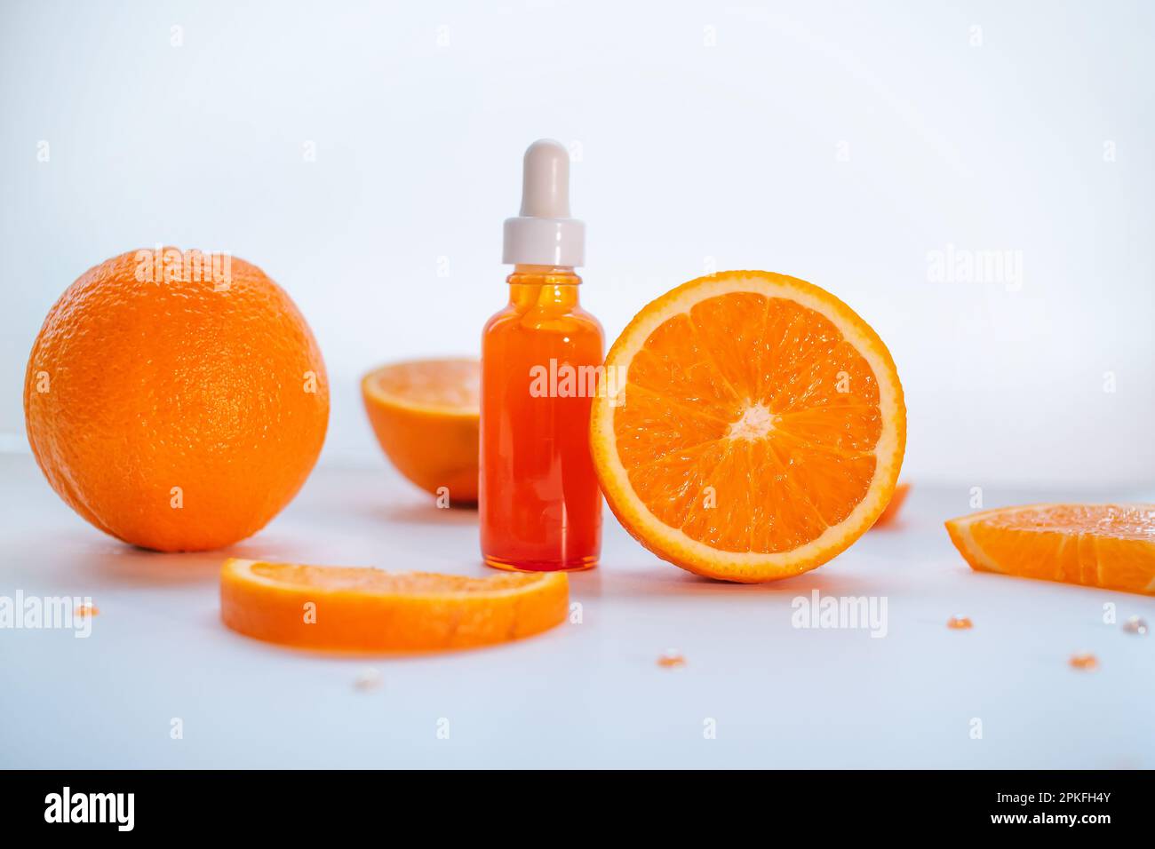 Vitamin C face skin care cosmetic concept - organic serum in a bottle ...