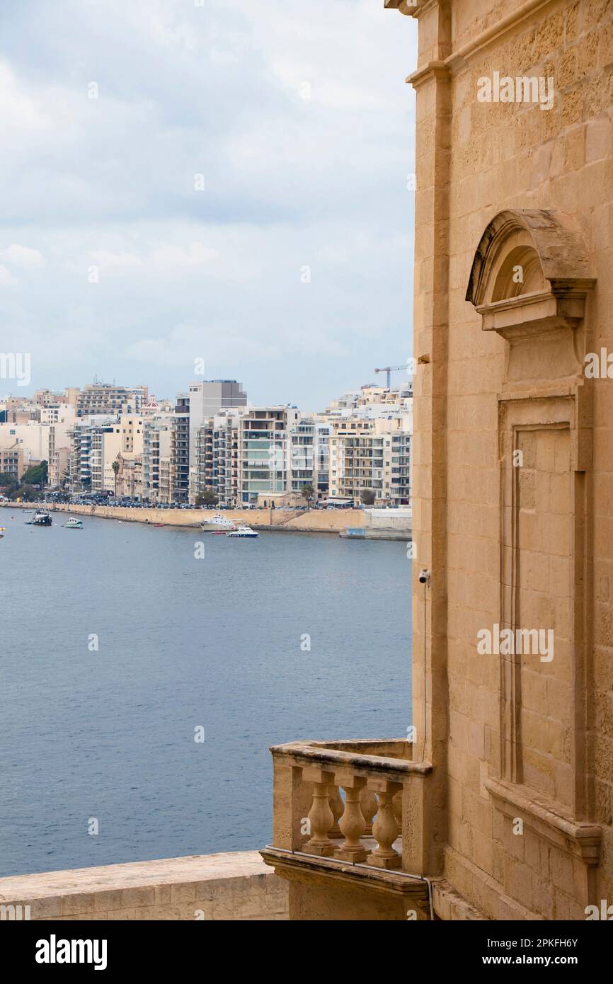 Valletta, Malta - November 12, 2022: Limestone corner house with a ...