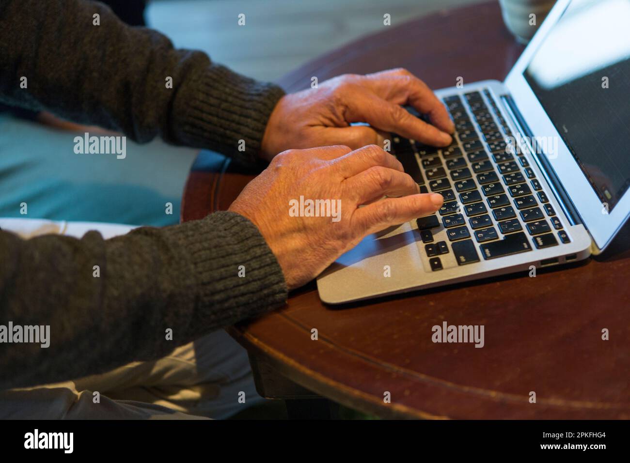 A couple of seniors doing research on a computer Stock Photo - Alamy