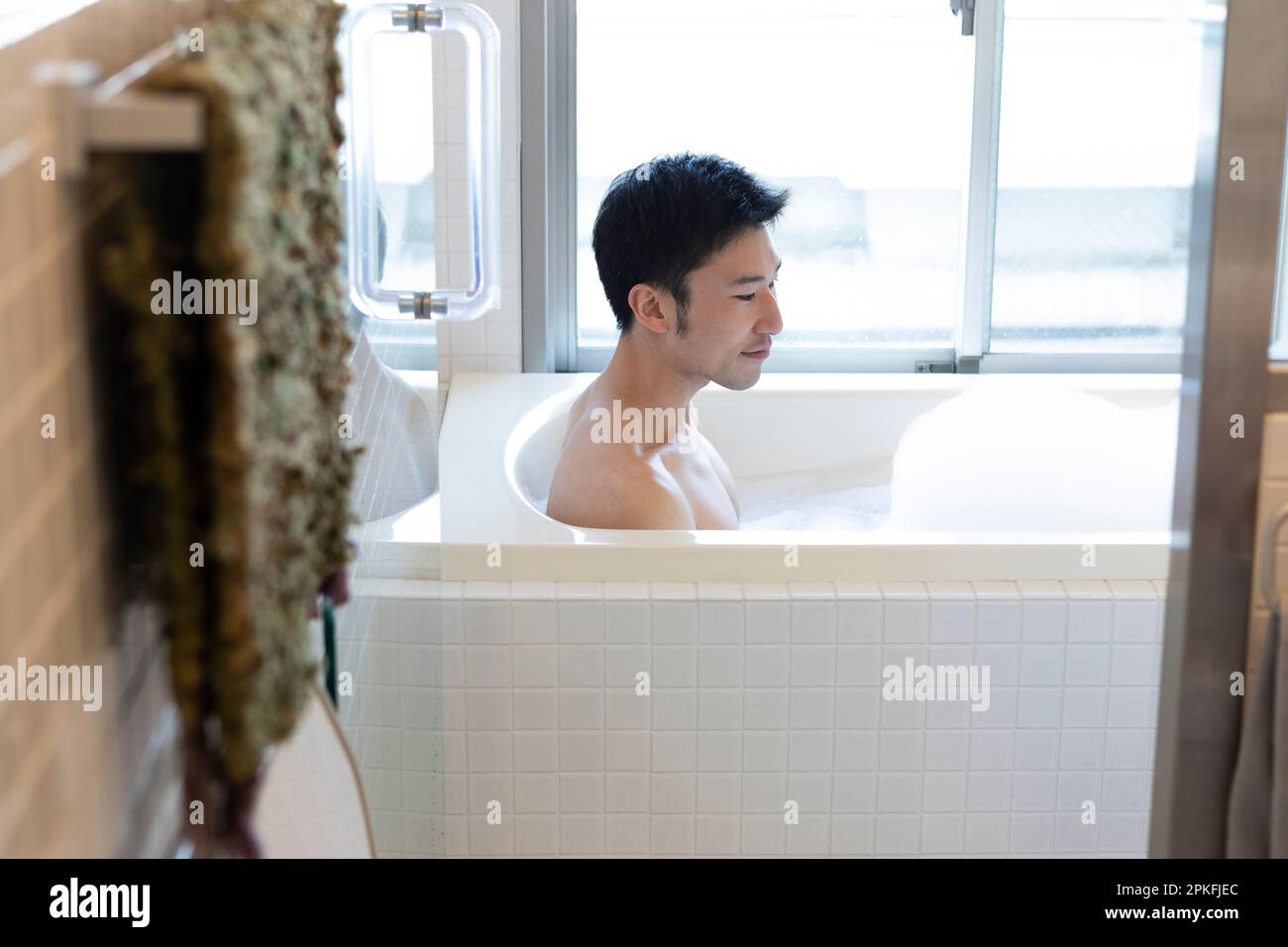 A man taking a bath Stock Photo - Alamy