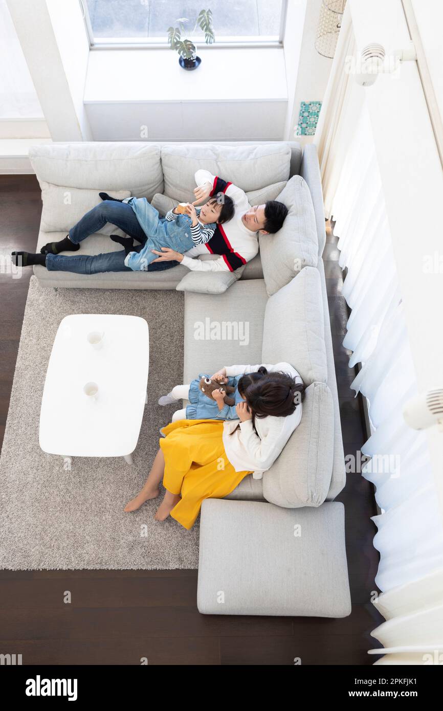 Family low angle sitting hi-res stock photography and images - Alamy