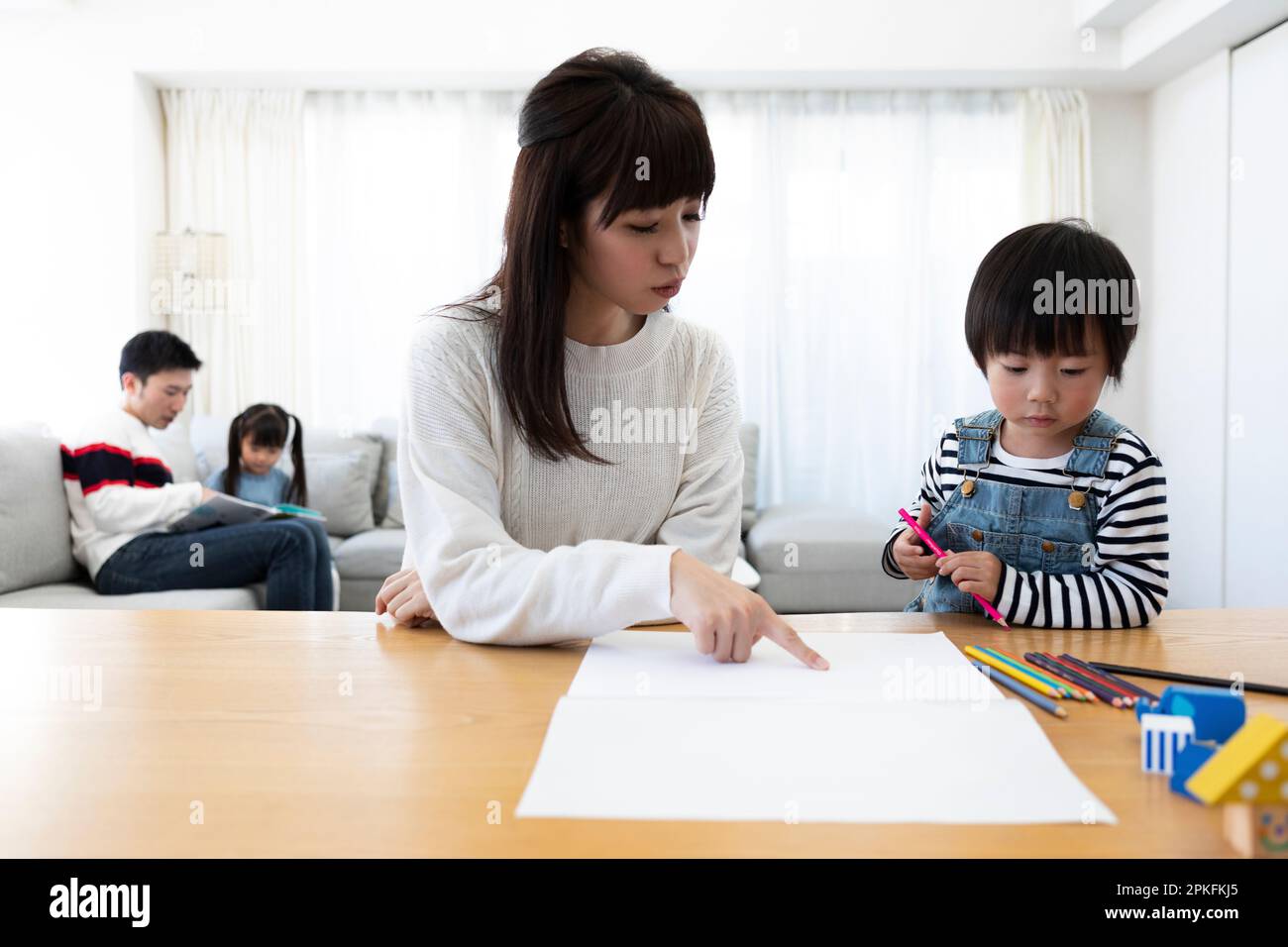 Parent and child drawing Stock Photo - Alamy