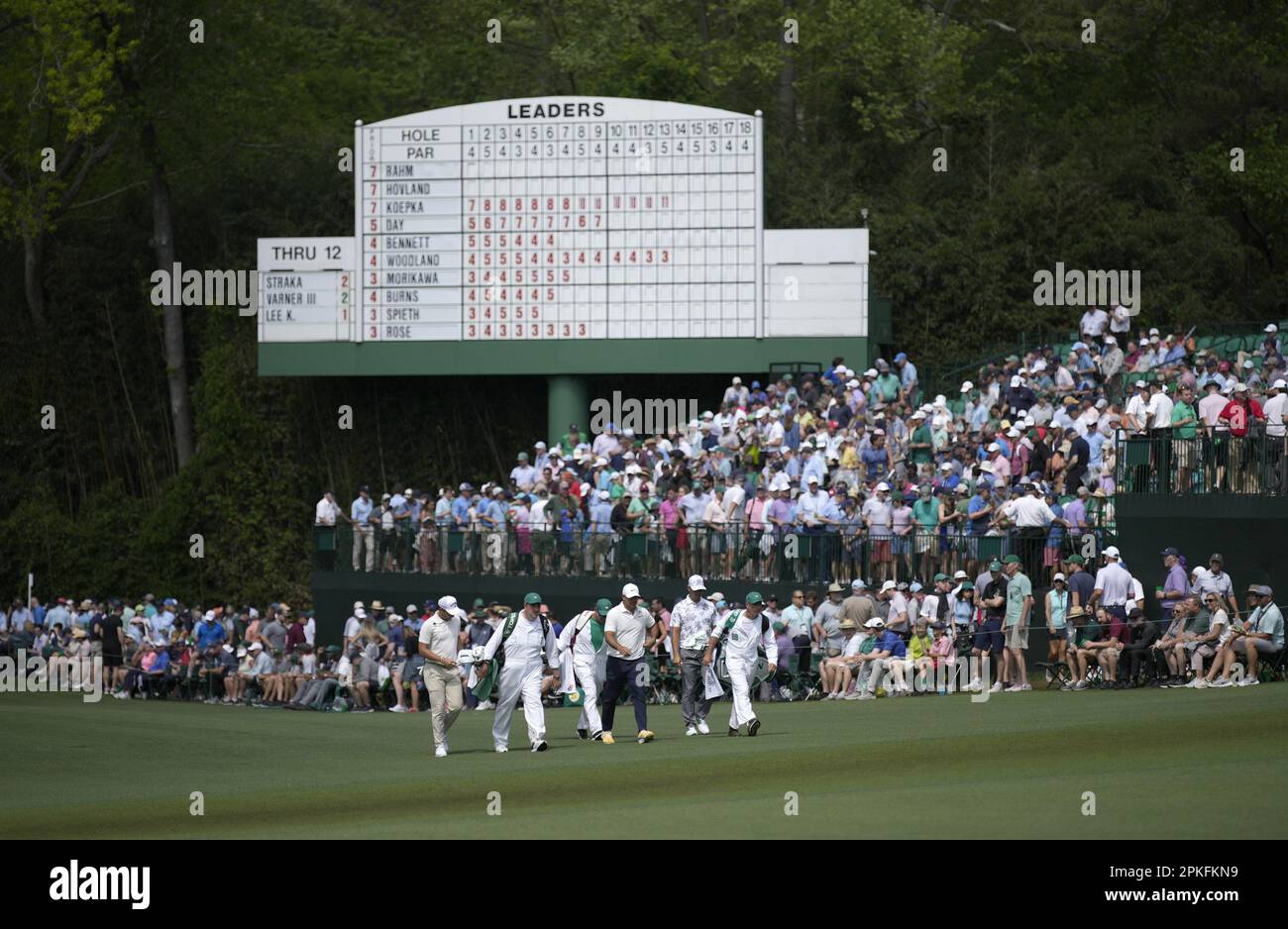 Augusta, United States. 07th Apr, 2023. Leader Brooks Koepka (C) walks ...