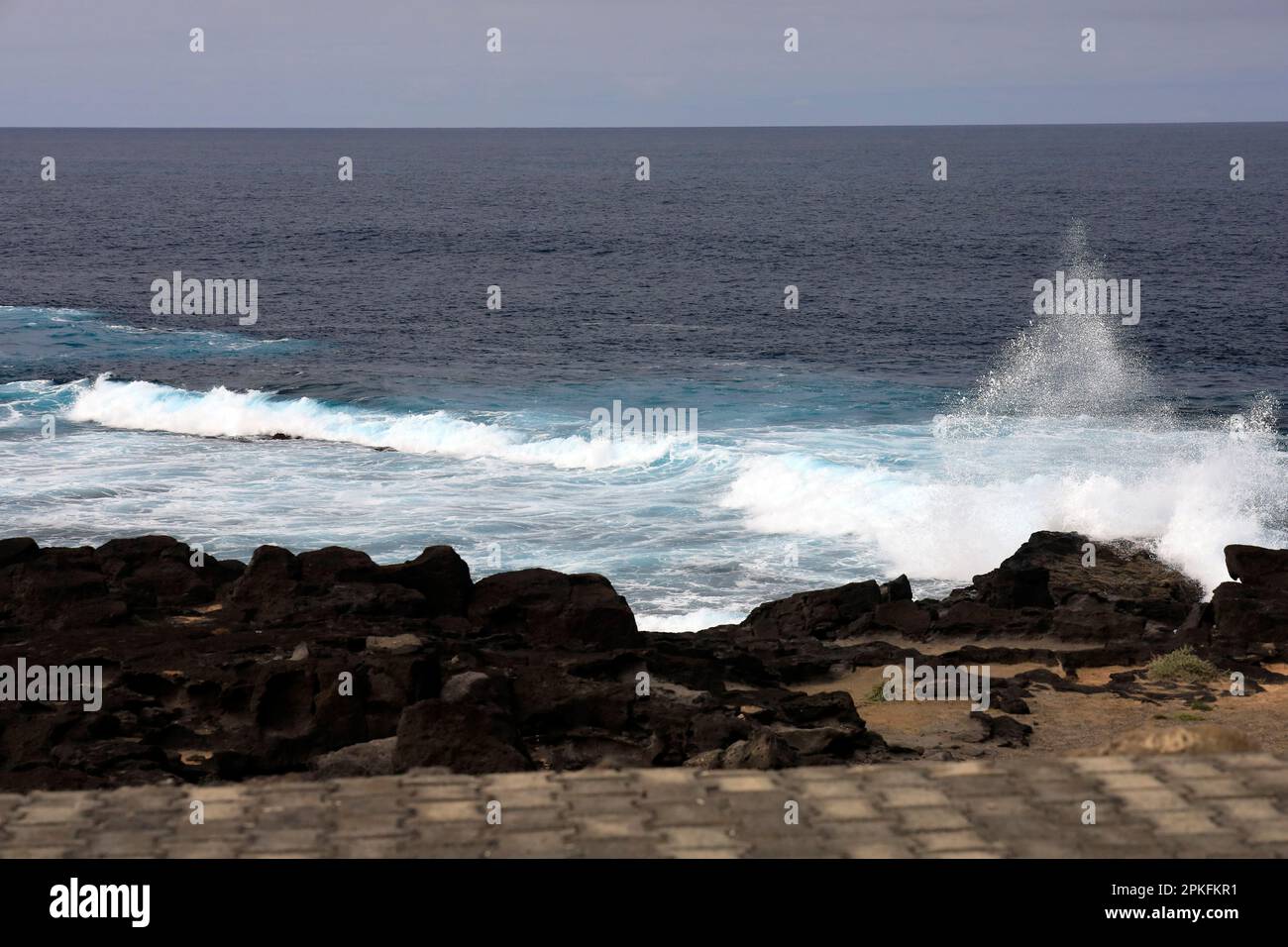 Crashing Atlantic waves on a desolate stretch of coastline near the ...
