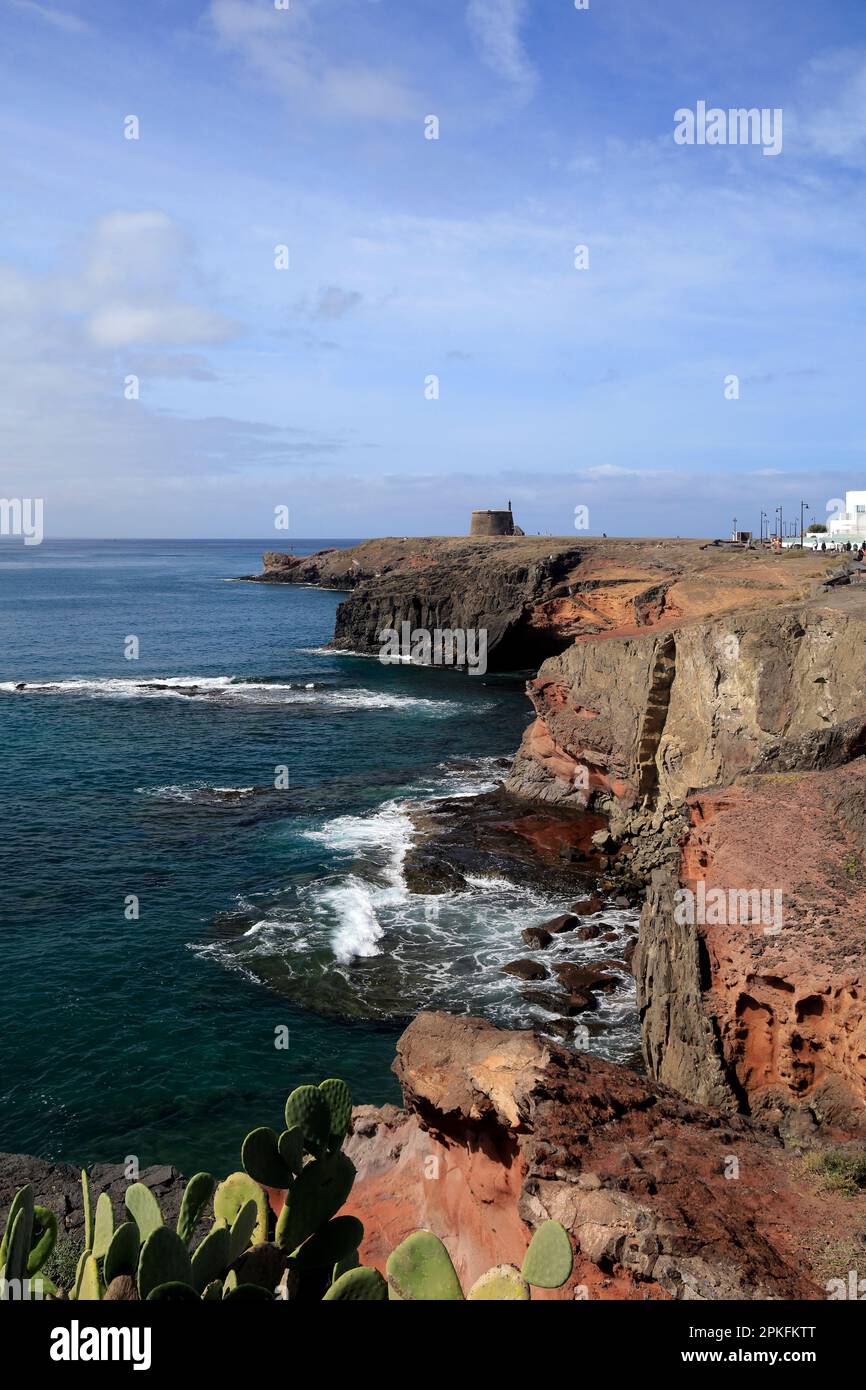 Crashing Atlantic waves, along the desolate coast at Torre Del Aguila ...