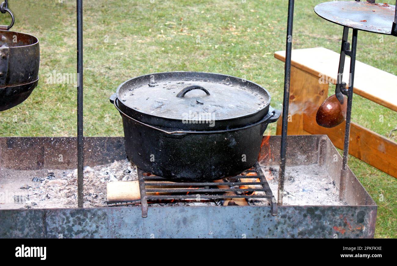 An Old Style Outdoor Cooking Stove with a Wood Fire Stock Photo - Alamy