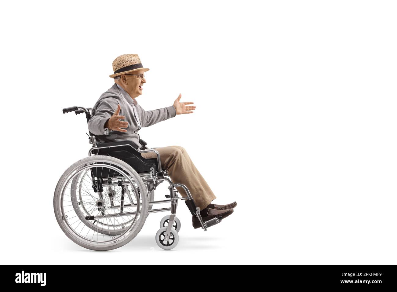 Elderly man in a wheelchair smiling and spreading arms isolated on ...