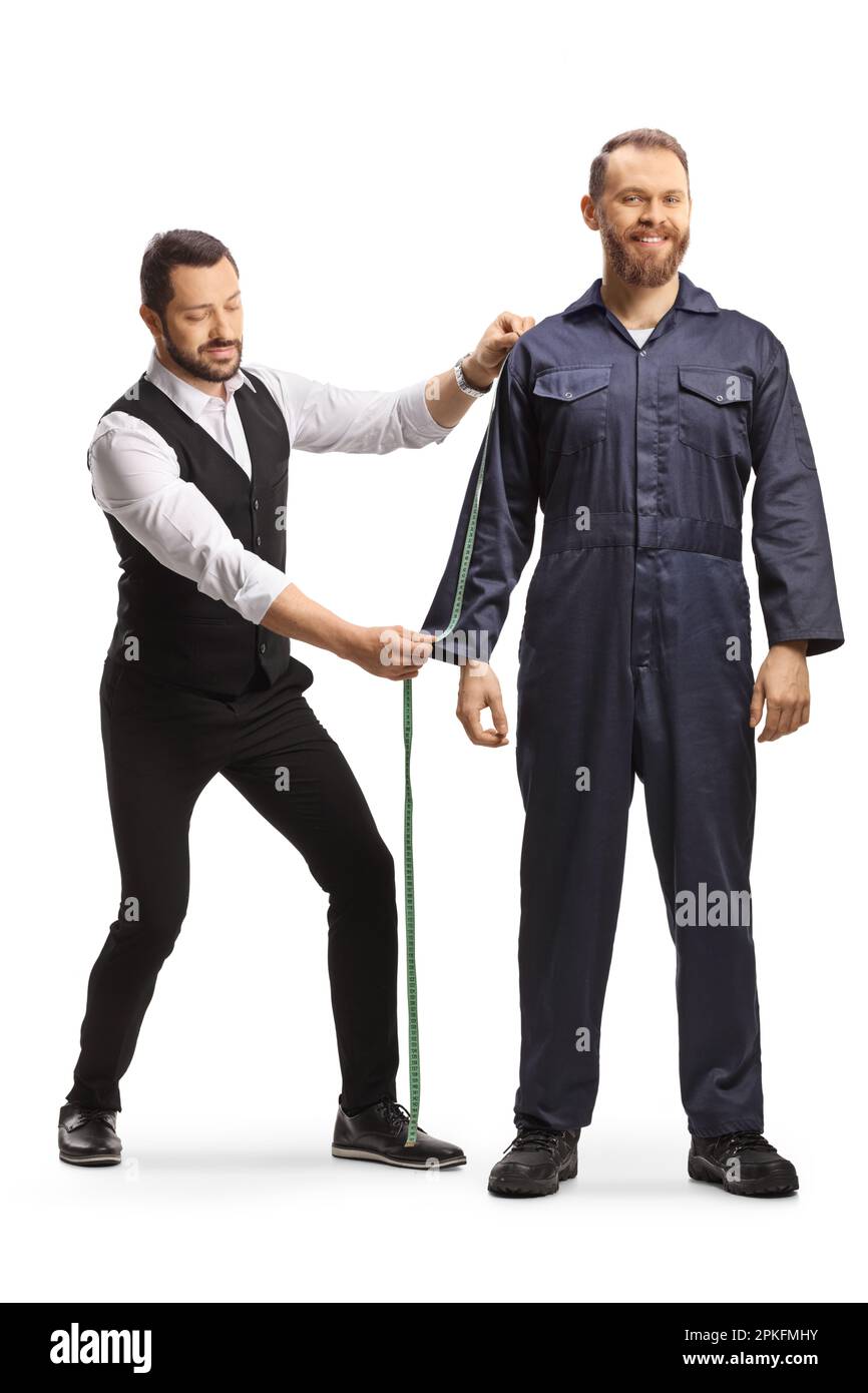 Tailor measuring a male overall uniform for a worker isolated on white ...