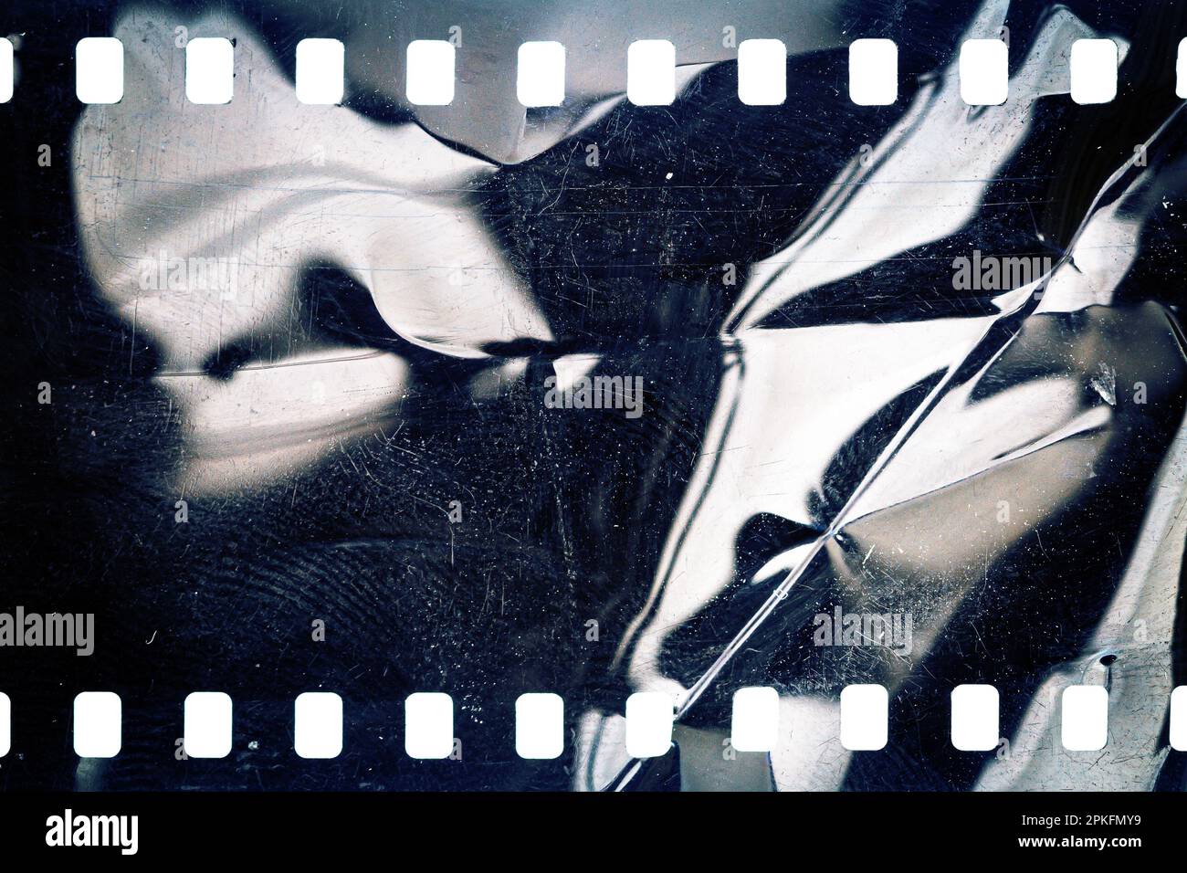 Dusty and grungy 35mm film texture or surface. Perforated scratched ...