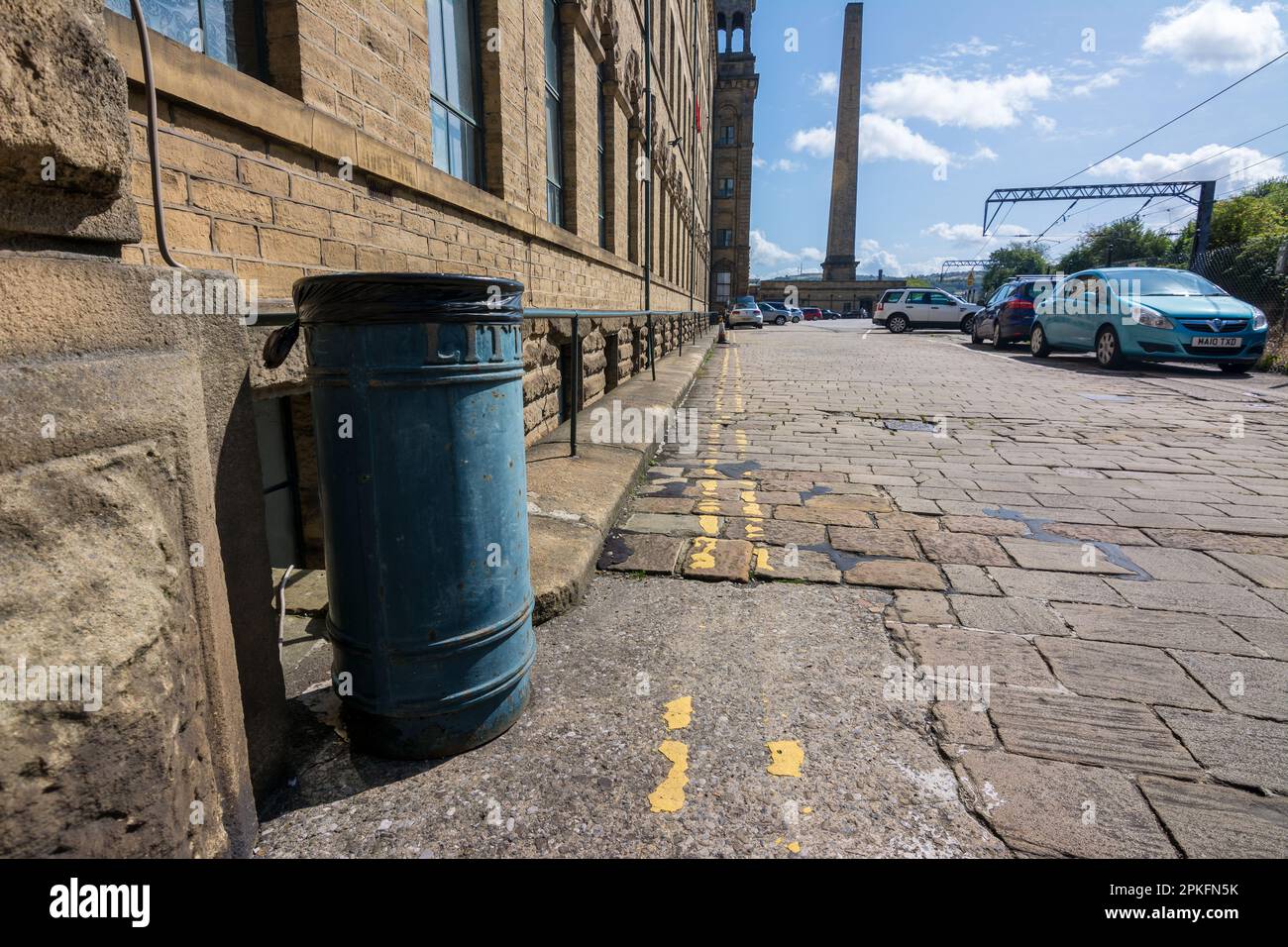 An old metal litter bin outside Salts Mill, Saltaire, Yorkshire Dales ...