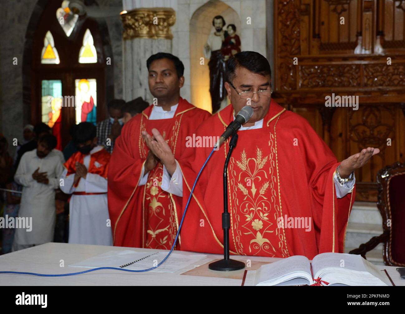 Members of Christian community engaging in services of Good Friday, at ...