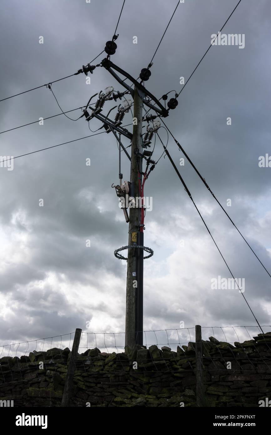 An 11kV overhead line pole seen from the Dales High Way long distance ...