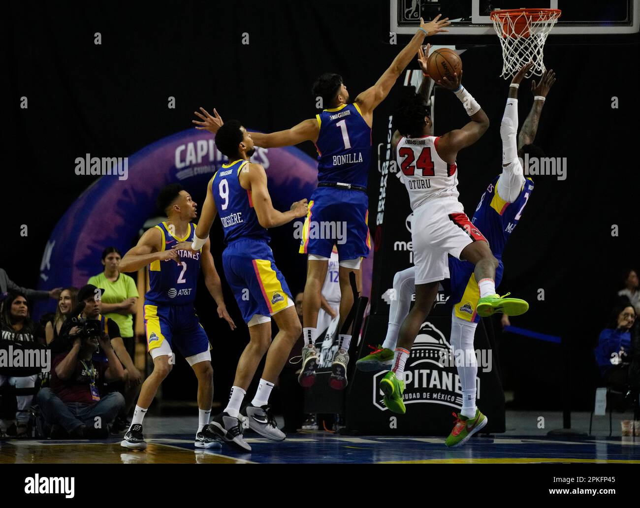 Mexico City Capitanes' Gael Bonilla works to block a shot by Windy City ...