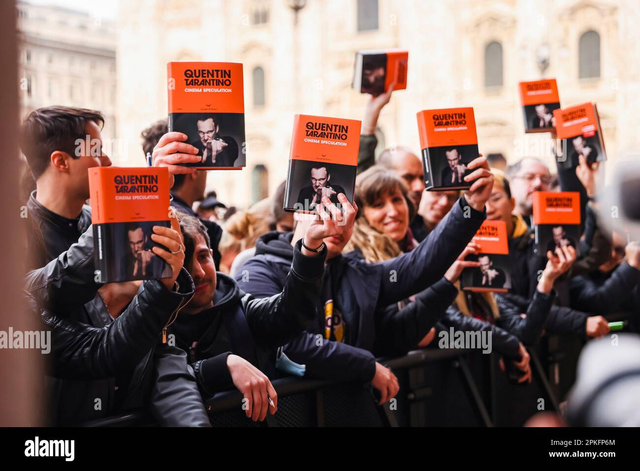 Fans show their copies of the book as director Quentin Tarantino ...
