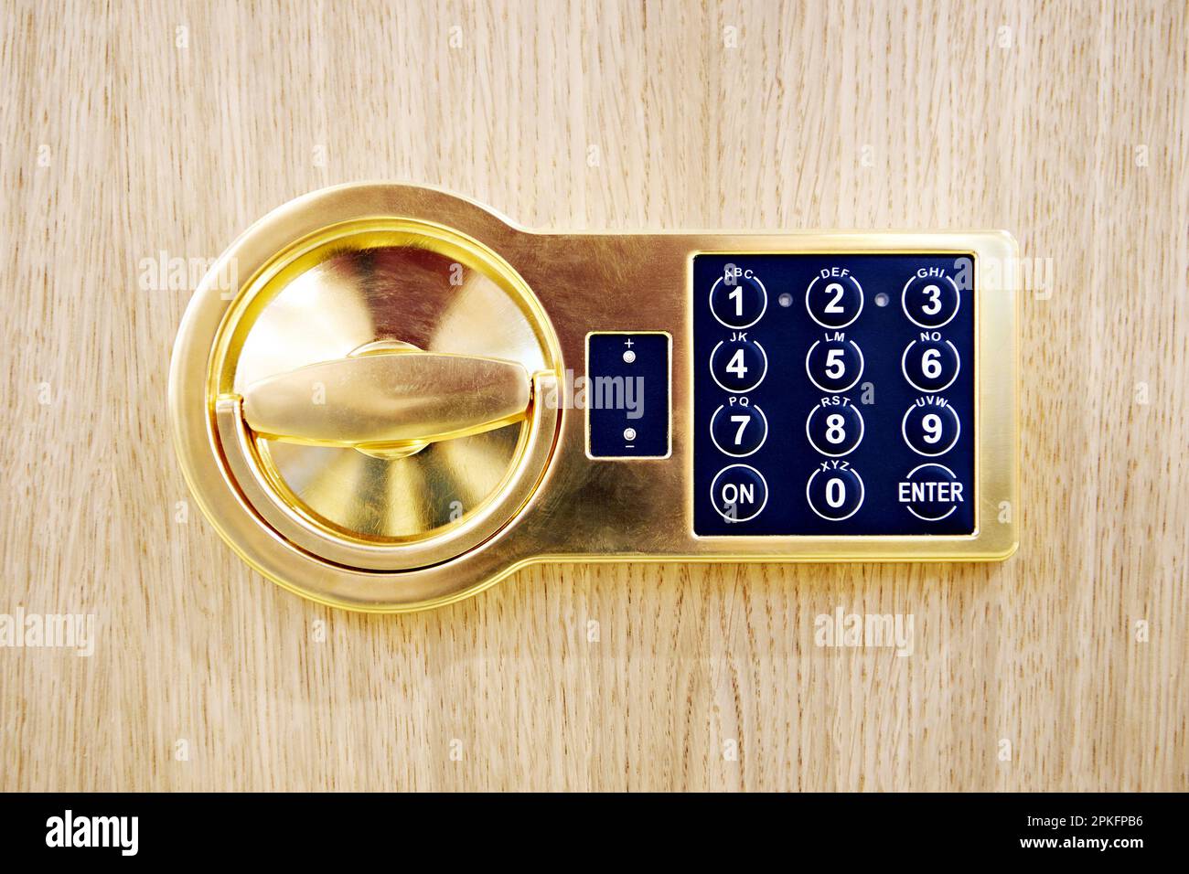 Digital combination safe lock golden Stock Photo - Alamy