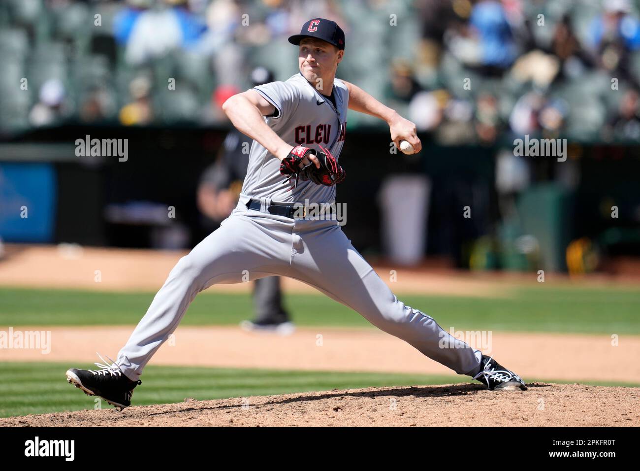 Cleveland Guardians' Tim Herrin against the Oakland Athletics during a ...