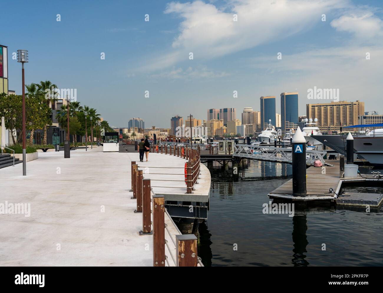 View along the Creek towards Deira with large boats docked by the Al ...