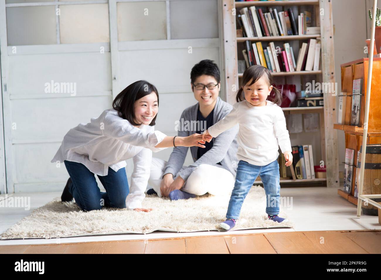 Family Dancing in Living Room Stock Photo - Alamy