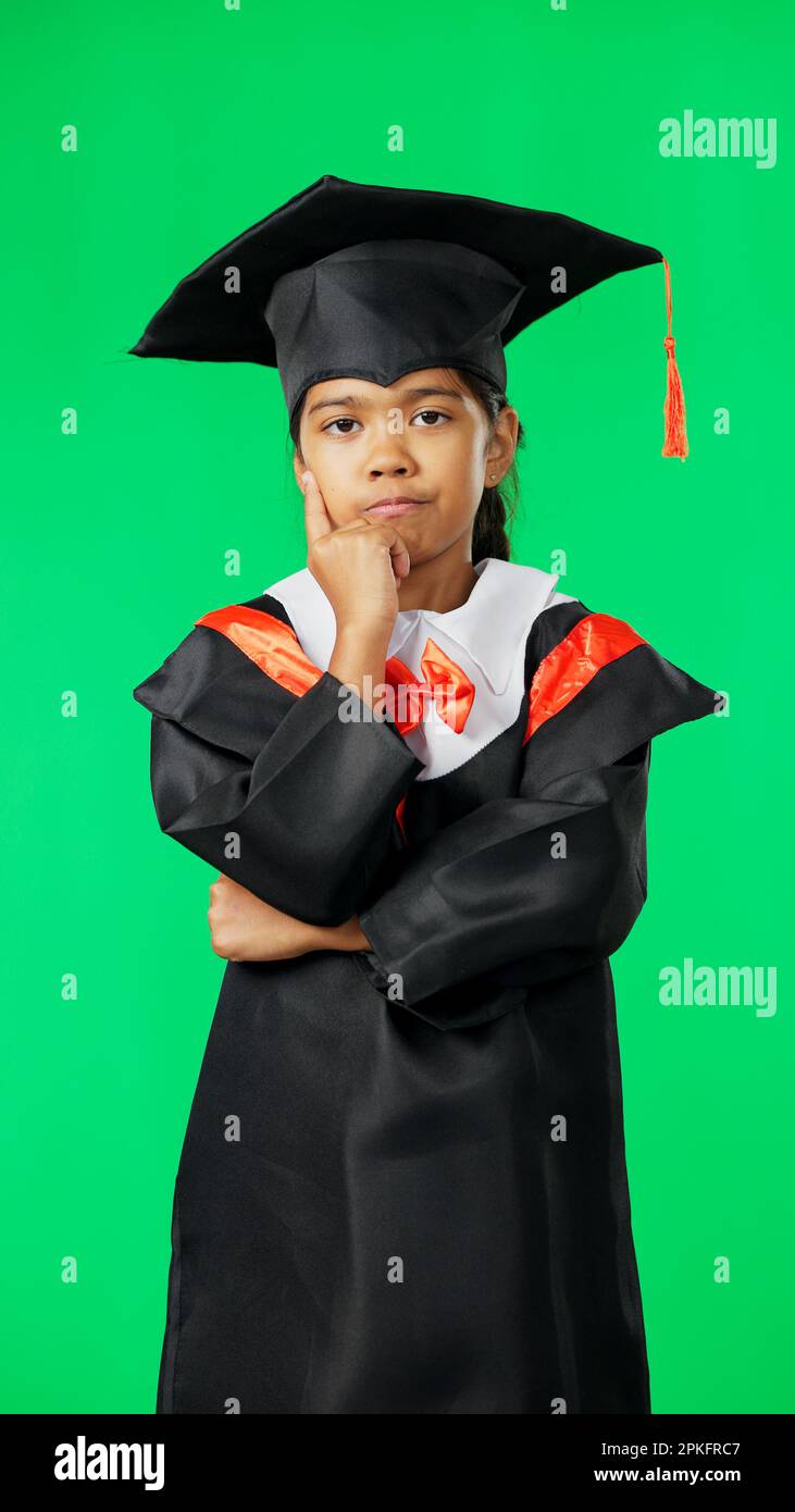 Graduation, education and thinking child on green screen for graduate ...
