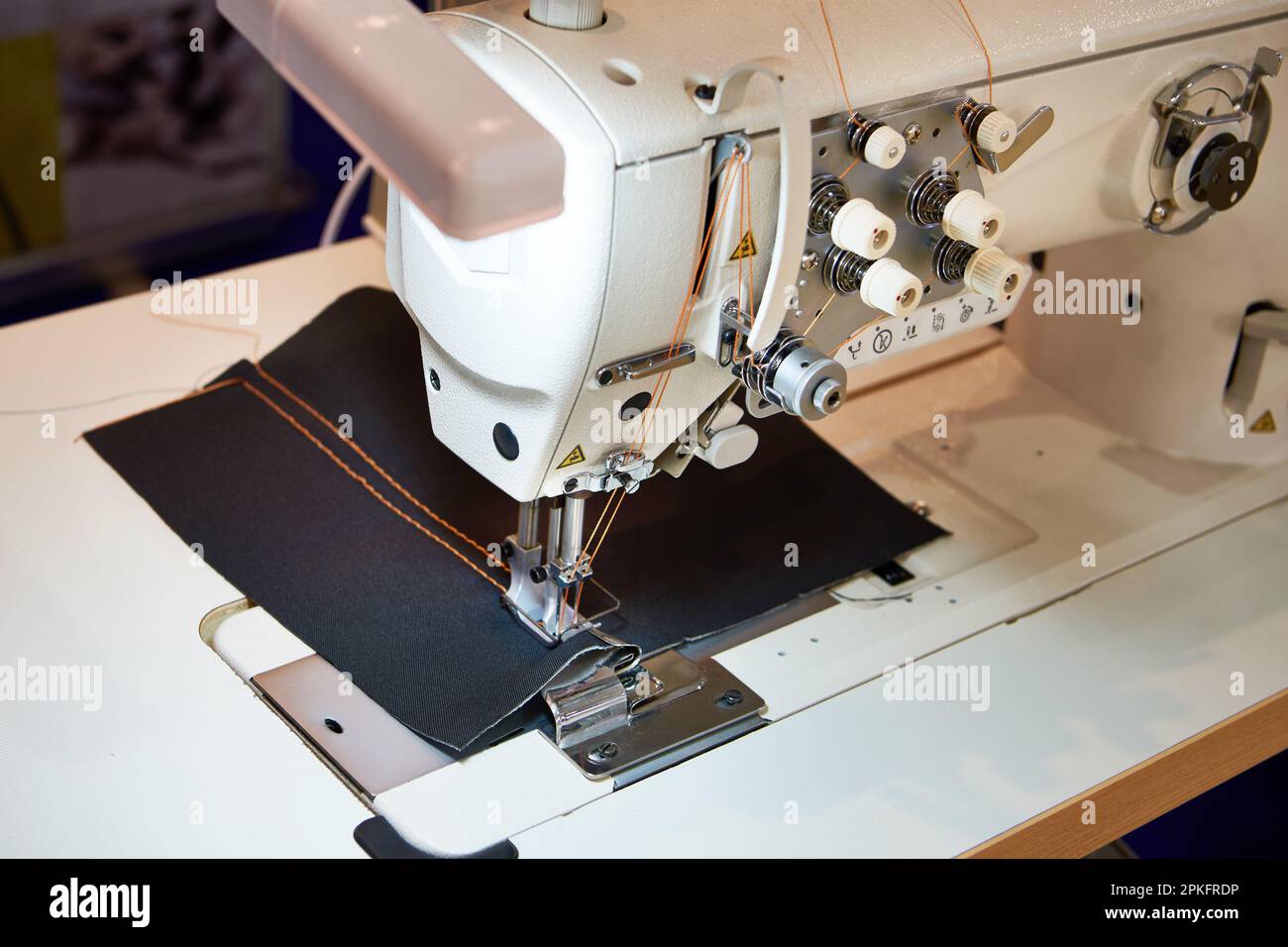 Needle and foot of sewing machine Stock Photo - Alamy