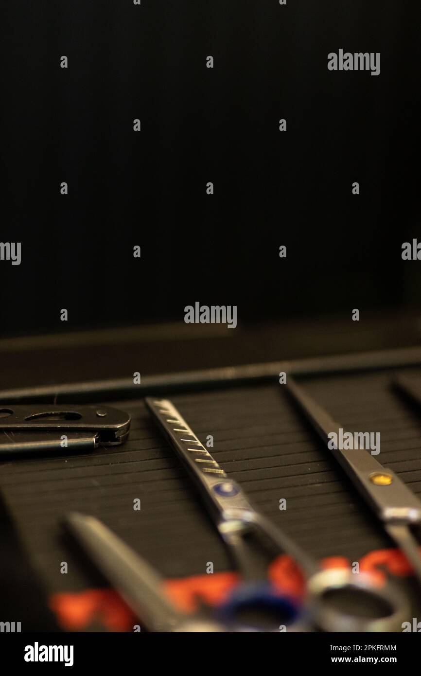 Scissors and razors on barber's work table Stock Photo - Alamy