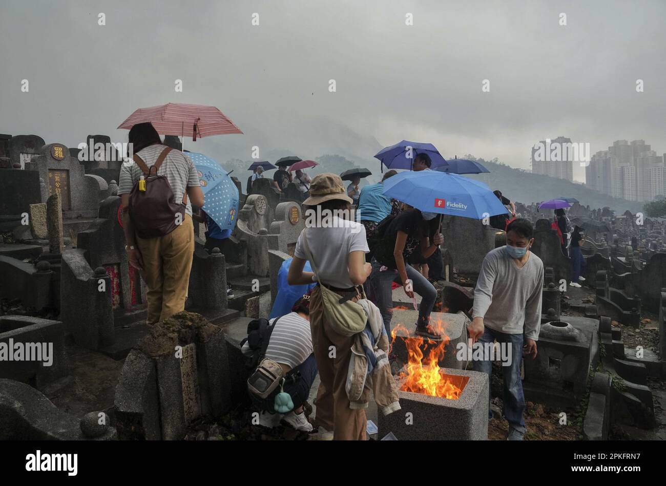 Grave sweepers worship their ancestors at Diamond Hill Cemetery on ...