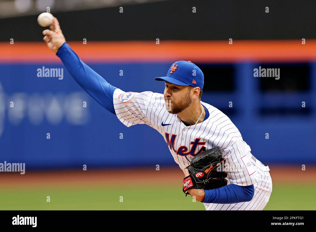 New York Mets pitcher Tylor Megill throws during the first inning of a ...