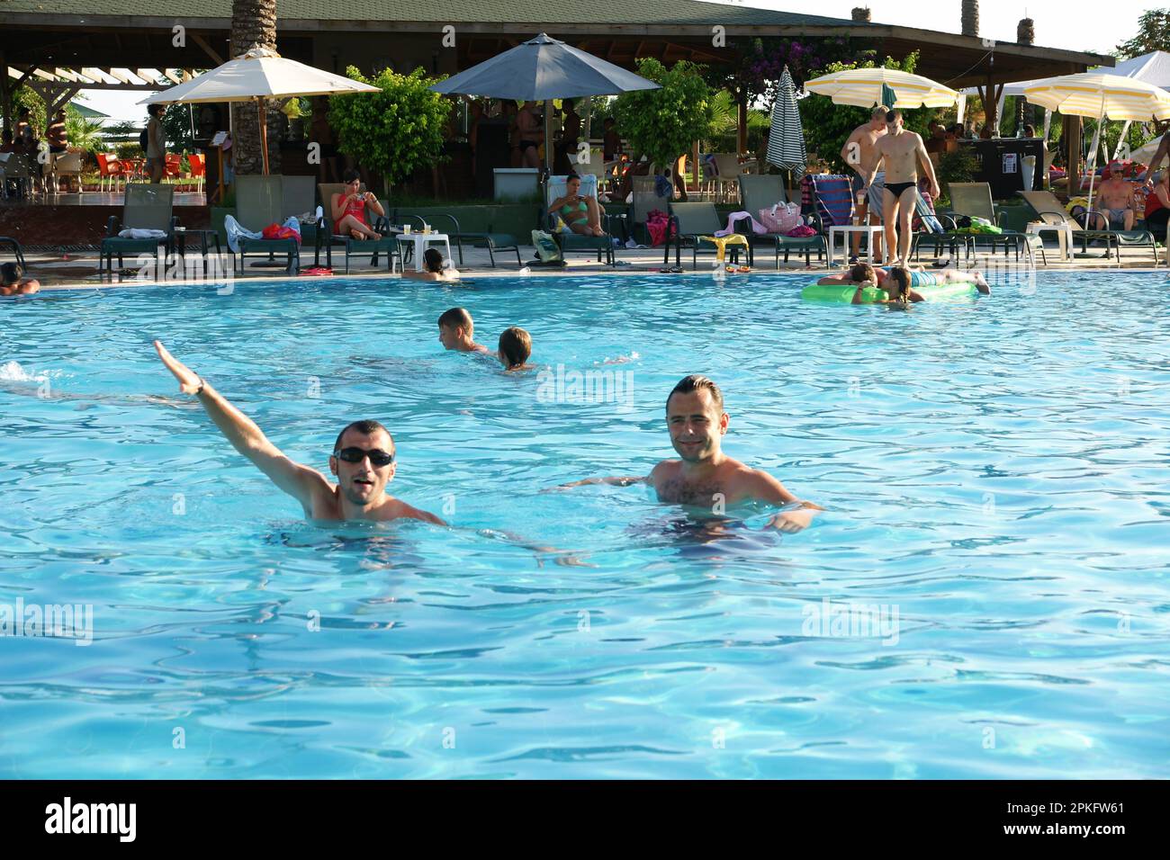 People having fun in the hotel pool Stock Photo - Alamy