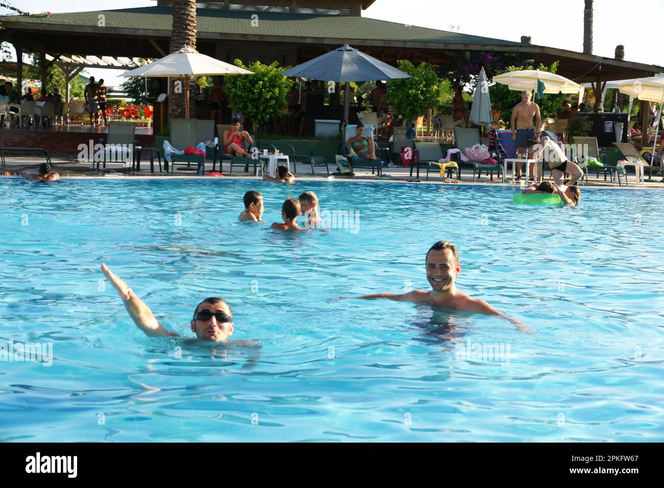 People having fun in the hotel pool Stock Photo - Alamy