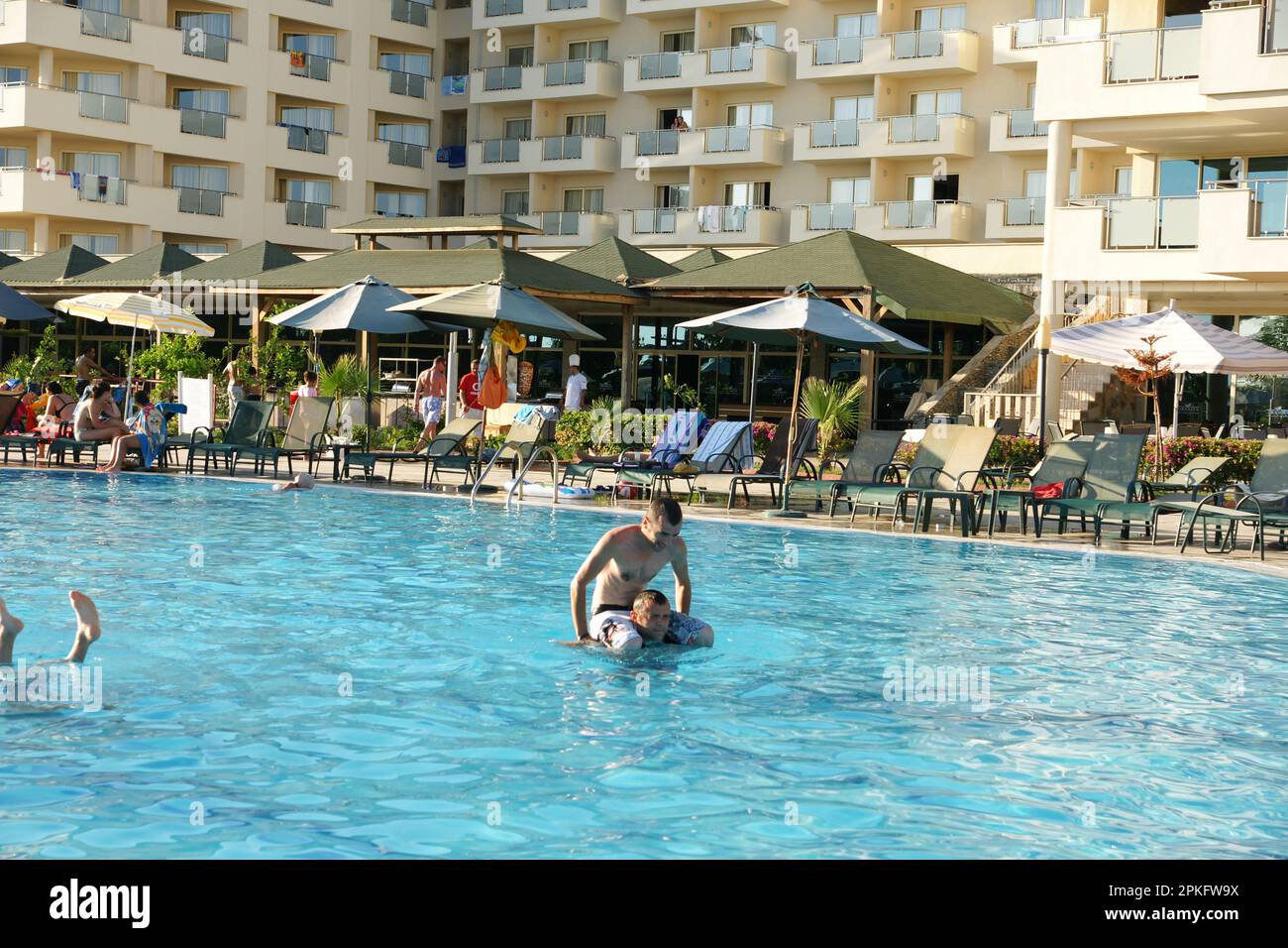 People having fun in the hotel pool Stock Photo - Alamy
