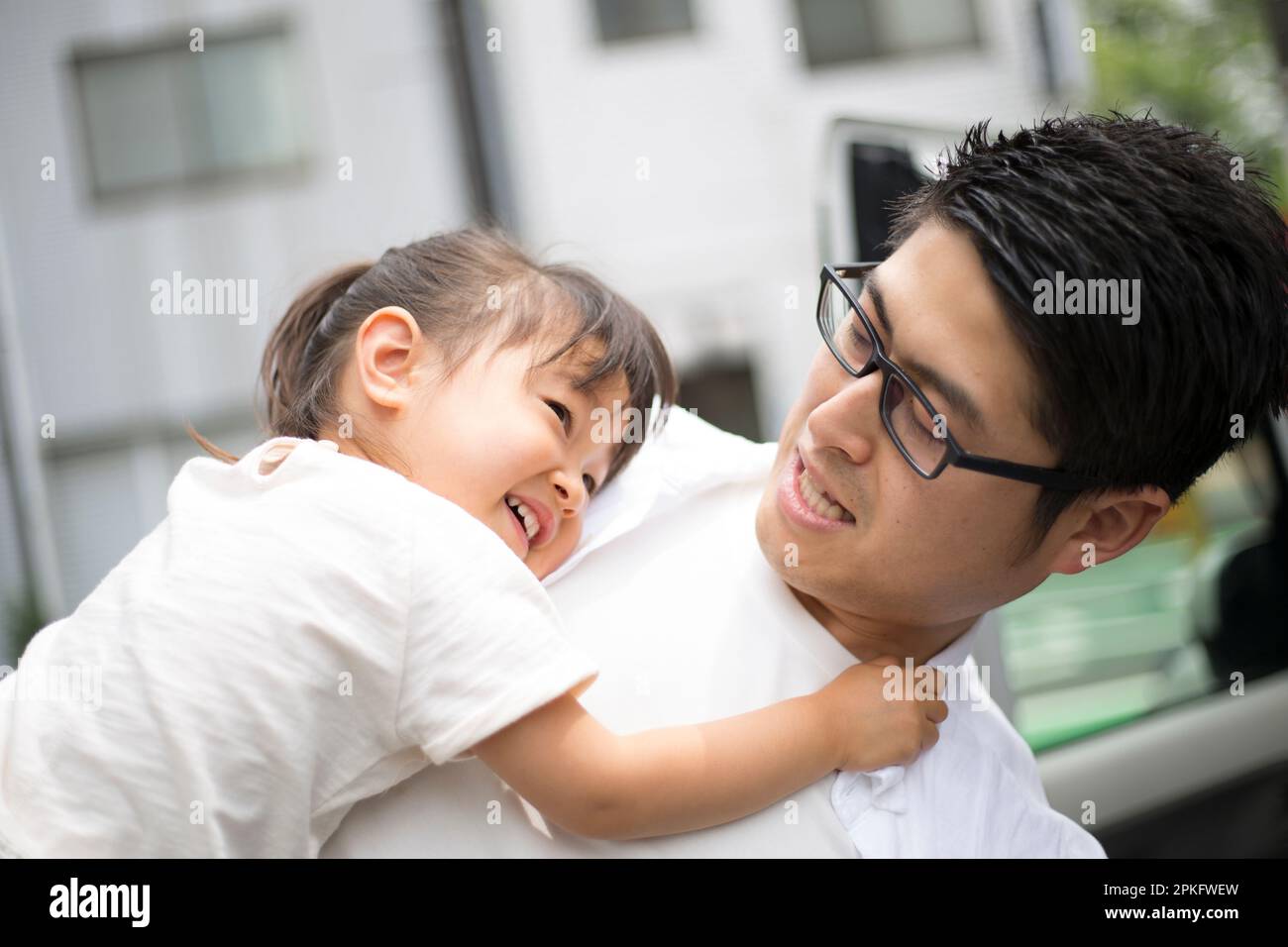 Girl Hugging Father Stock Photo - Alamy
