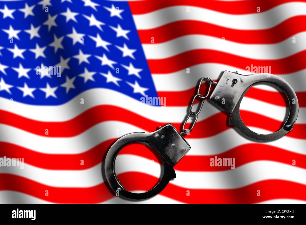 handcuffs on the background of the USA flag, the concept of crime in ...