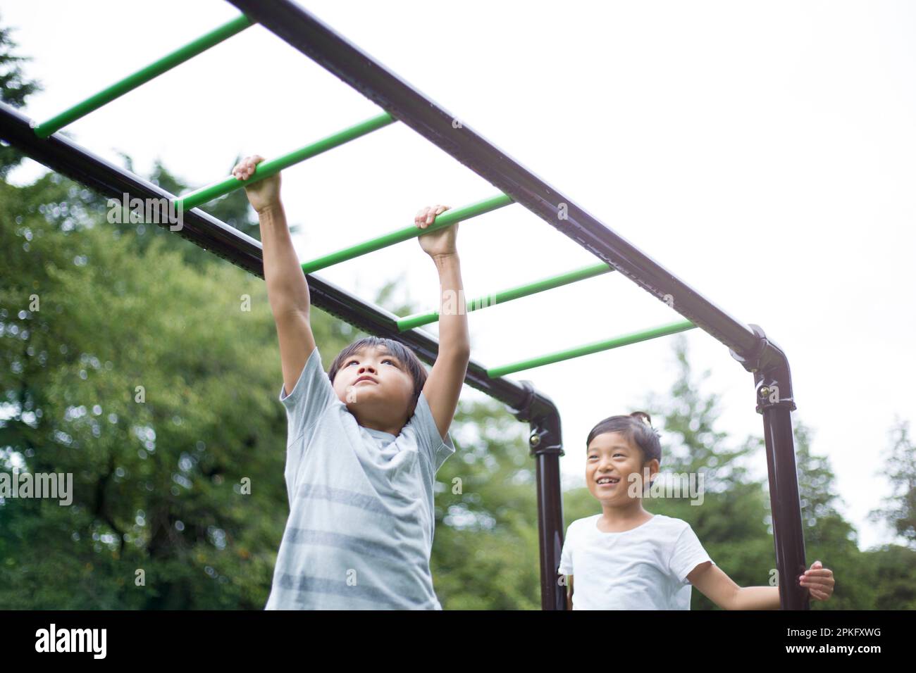 Elementary school children doing a cartwheel Stock Photo - Alamy