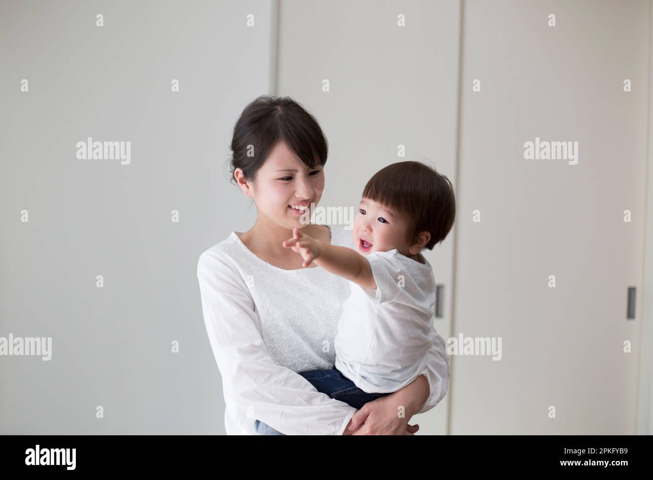 Asian mother holding cute hi-res stock photography and images - Alamy