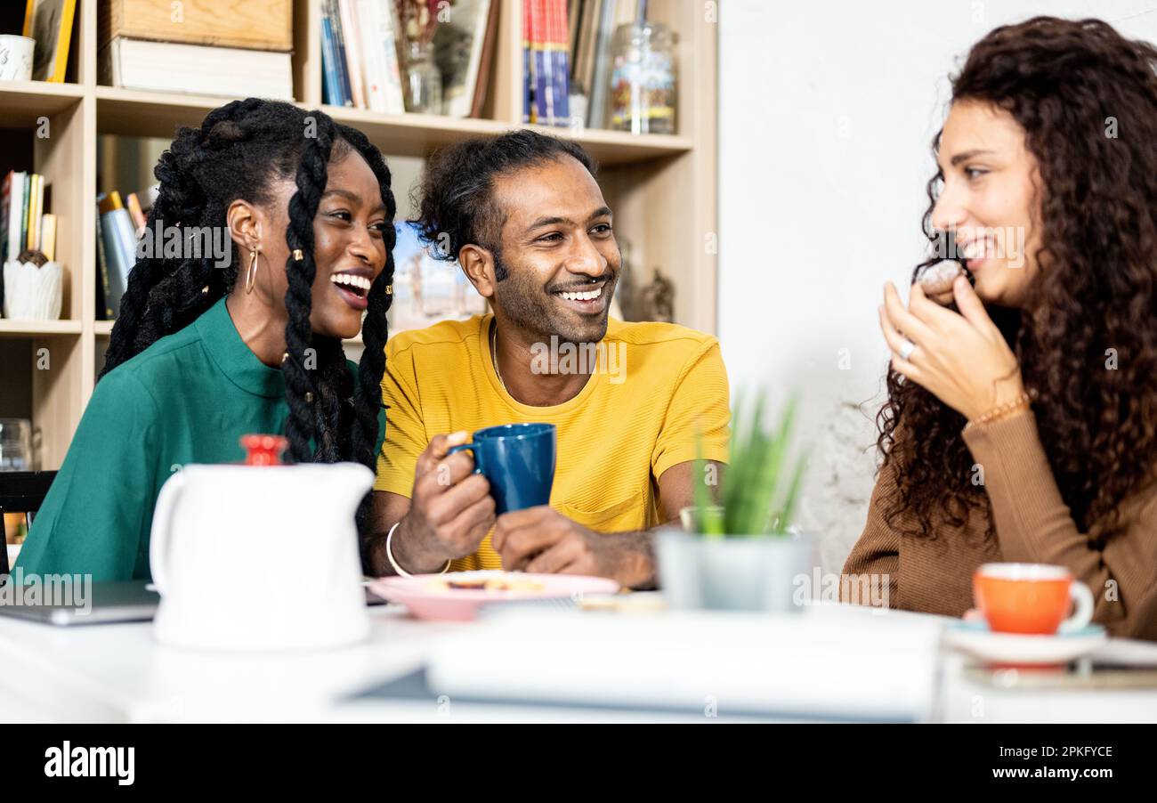 Happy indian family at restaurant hi-res stock photography and images ...