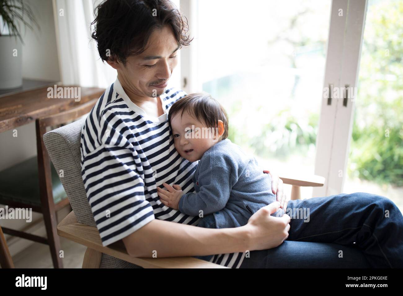 Baby sitting photo hi-res stock photography and images - Alamy