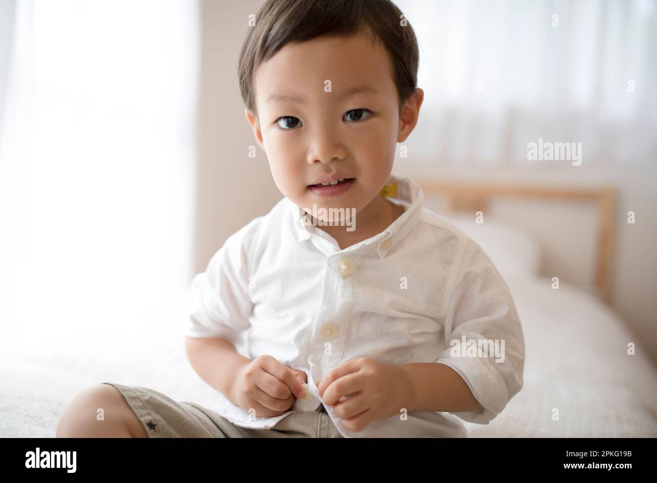 Boy changing clothes hi-res stock photography and images - Alamy