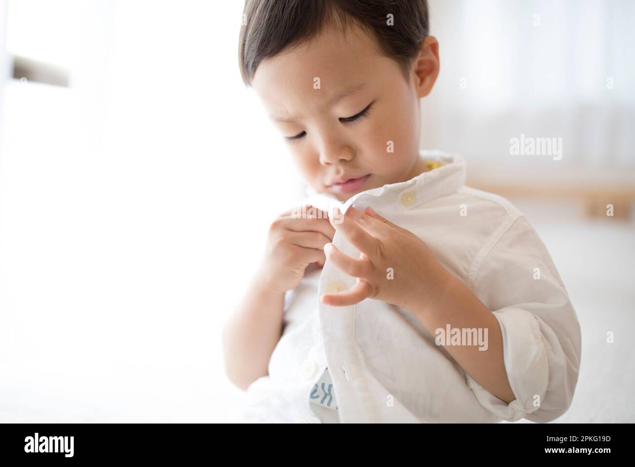 Boy changing clothes hi-res stock photography and images - Alamy