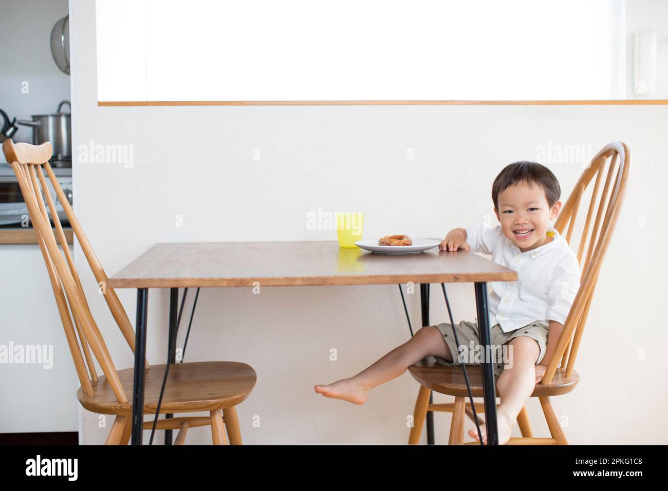 Toddler eating snack hi-res stock photography and images - Alamy